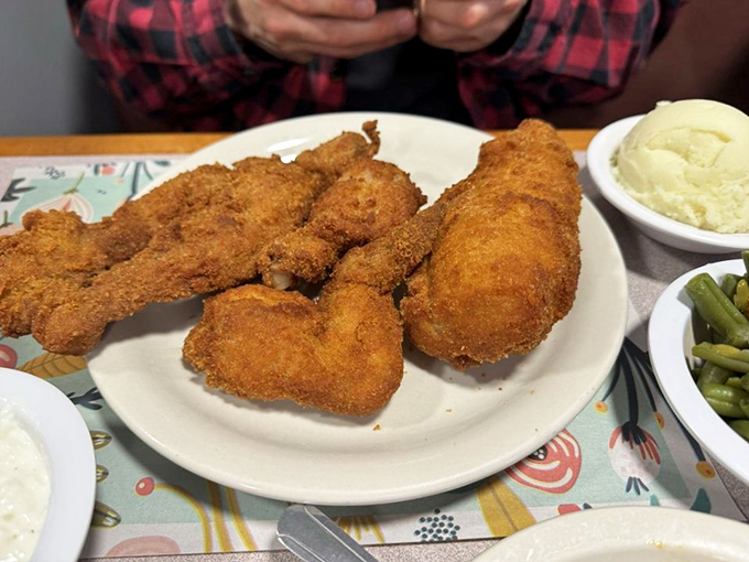 Barberton chicken isn't just fried chicken—it's a master class in crispy exteriors protecting juicy interiors, with sides playing crucial supporting roles.