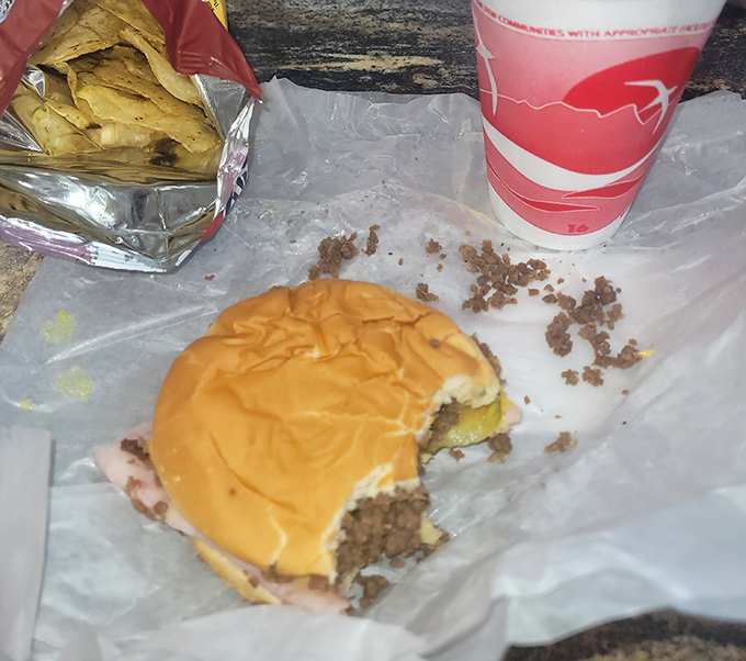 The aftermath of sandwich bliss—half-eaten evidence that sometimes the most unassuming foods create the most powerful cravings.