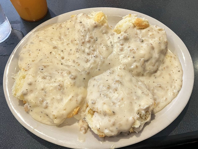 These biscuits and gravy aren't trying to be Instagram famous—they're too busy being exactly what your soul needs on a Sunday morning.