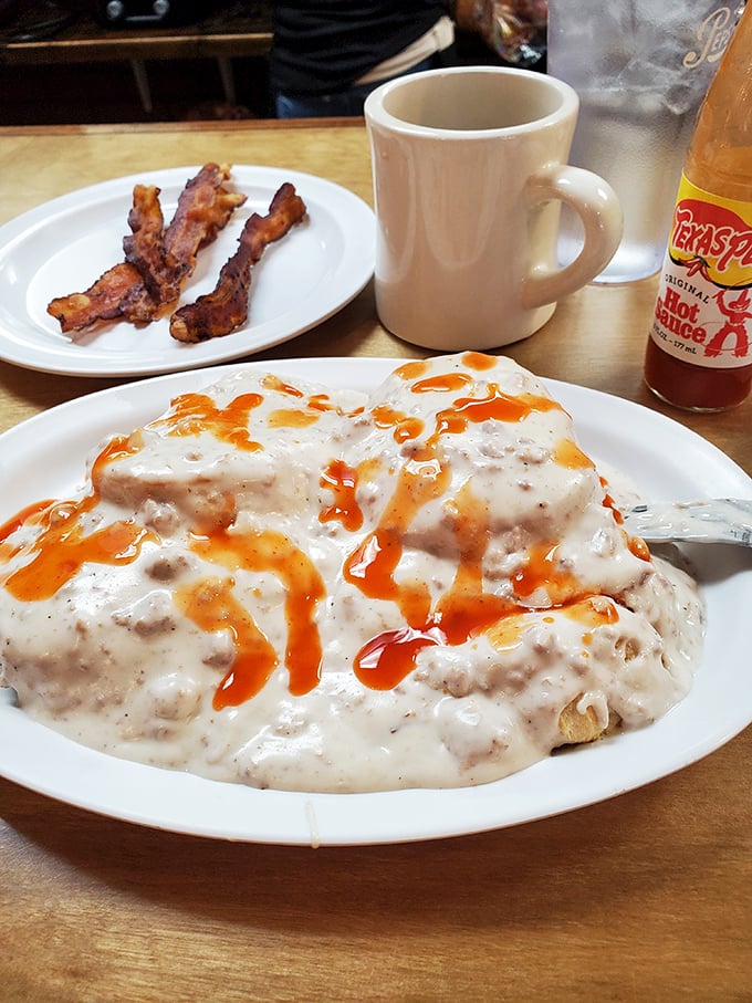 Biscuits swimming in sausage gravy represent everything right about traditional Southern breakfast done with genuine skill and heart.