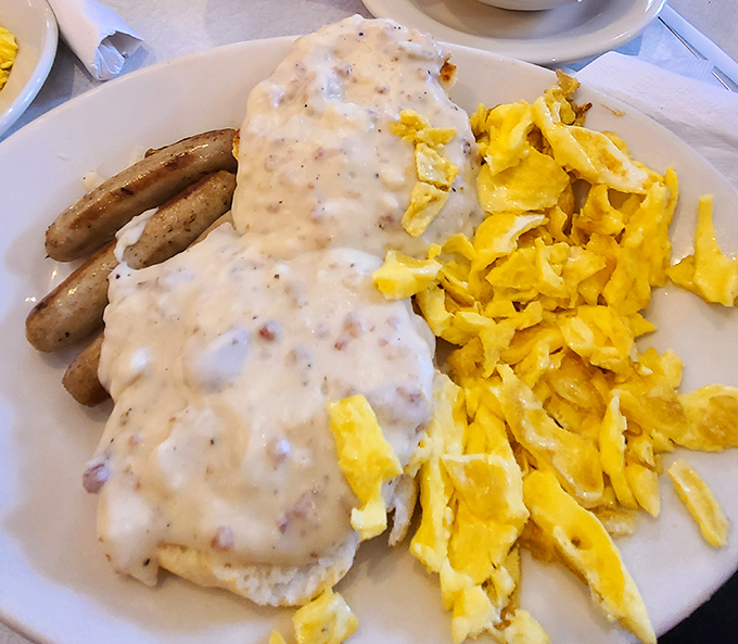When a plate of biscuits and gravy comes with sausage links and scrambled eggs, you know you're not leaving hungry—or vertical.