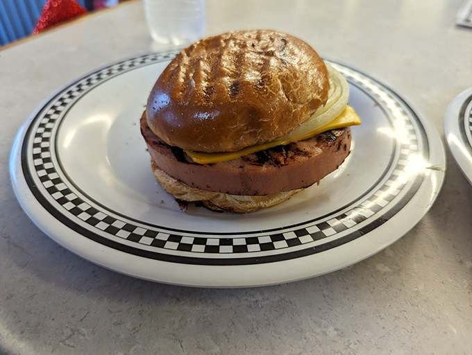The bologna sandwich – proof that childhood favorites can grow up without losing their soul. This isn't your lunchbox sandwich; this is nostalgia elevated.