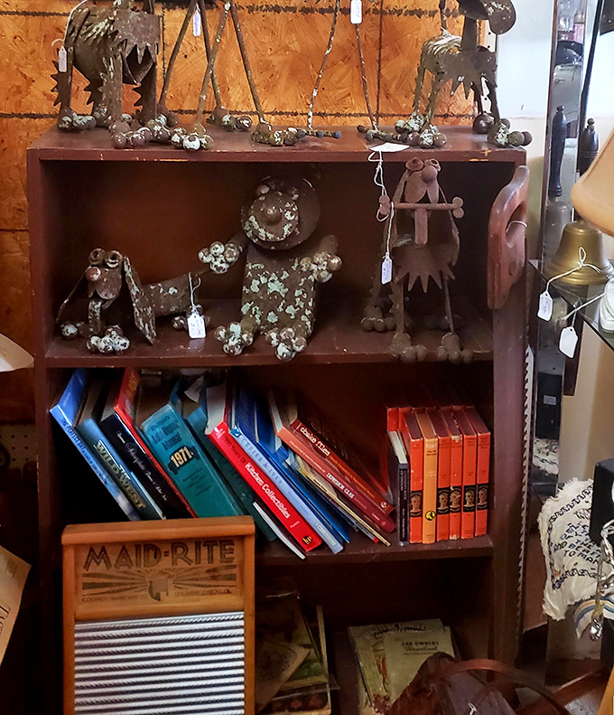 Not just a bookshelf but a museum of metal critters and vintage reads—where else can literature and quirky art coexist so perfectly?
