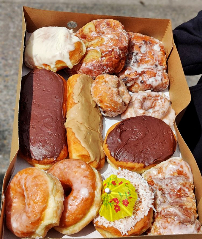 A box of Joe's donuts is like Noah's Ark for sweet treats—two of every kind, ensuring the survival of happiness through even the rainiest Oregon day.