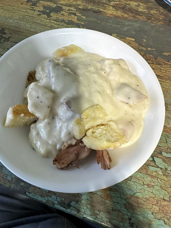 This breakfast bowl doesn't need a fancy name or artisanal credentials – it lets that blanket of creamy gravy do all the talking. 