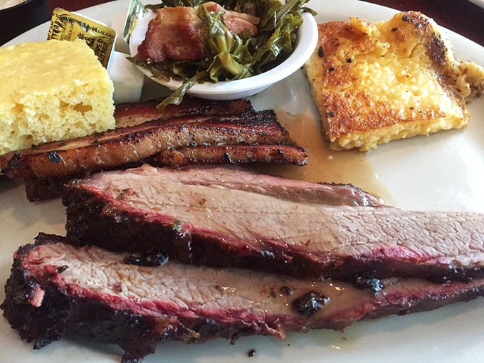 Meat candy for grown-ups: perfectly smoked brisket and pork belly sharing a plate with sides that refuse to be overshadowed.