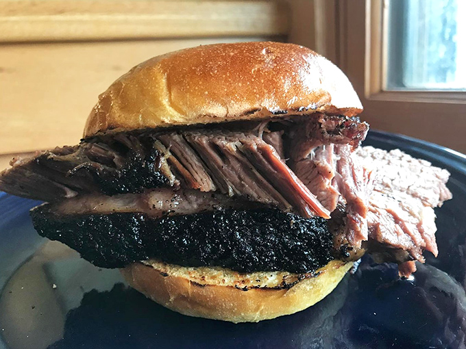 The brisket sandwich—where smoke-kissed meat meets pillowy bun in a relationship your taste buds will want to third-wheel.