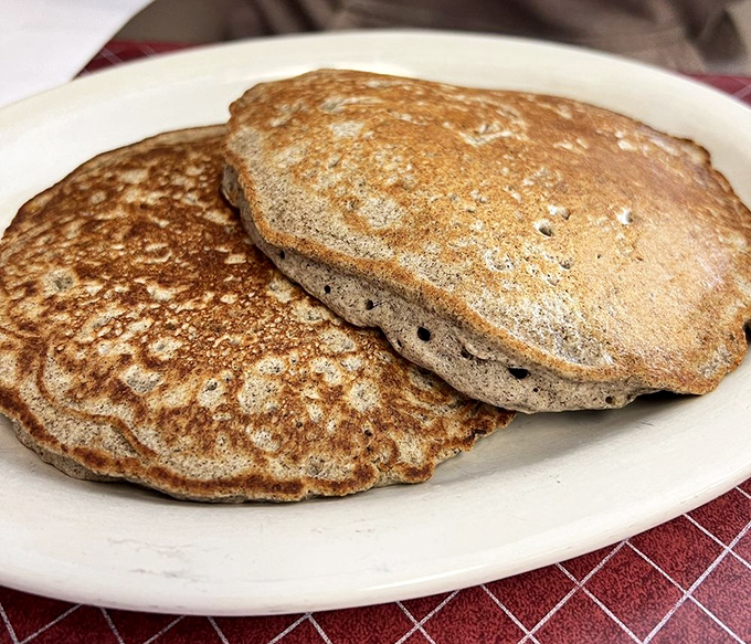 These buckwheat pancakes aren't just breakfast; they're an edible history lesson of Amish cooking traditions. No filter needed for this golden-brown perfection.