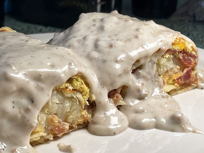 Breakfast burritos should always look this good. That sausage gravy blanket turns an already perfect package into something worth crossing state lines for.