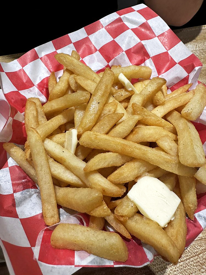 Golden fries with melting butter—because sometimes vegetables need to fulfill their highest calling as vehicles for dairy products.