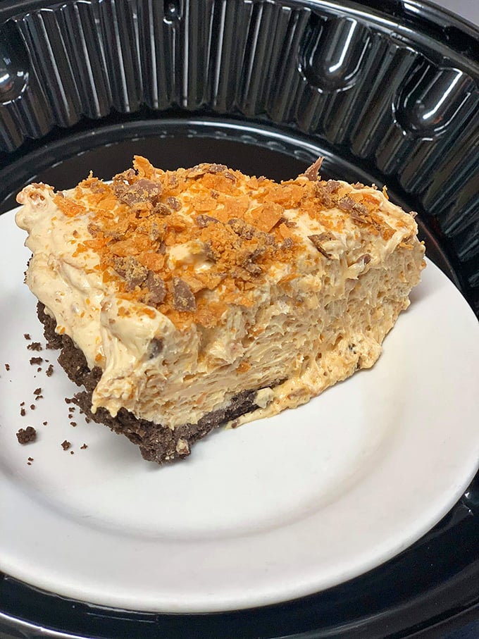Not all scientific breakthroughs happen in laboratories—this Butterfinger pie with its cloud-like texture proves some genius happens in the kitchen.