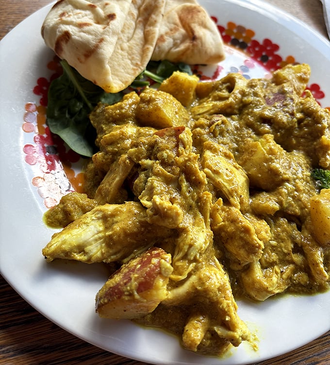 Britain's adopted national dish gets the Hoosier treatment – tender chicken in aromatic curry sauce with naan bread standing by for dipping duty.