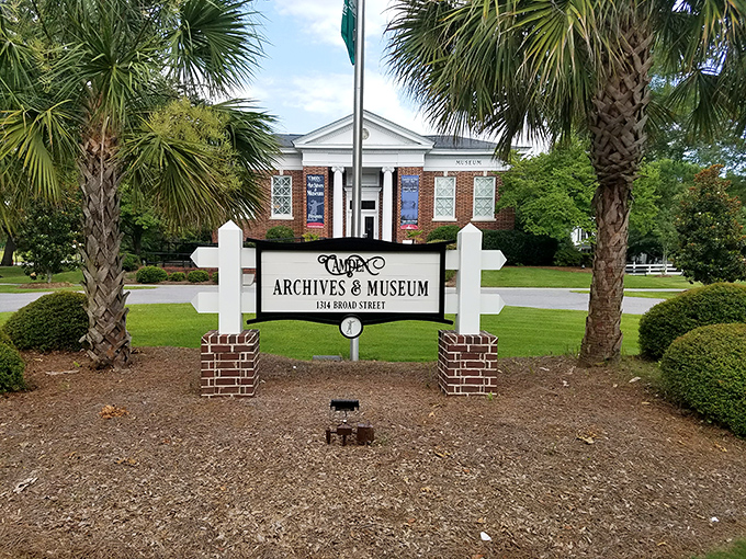 The Archives & Museum doesn't just preserve Camden's past; it celebrates it between those elegant palm trees and behind that classic white fence.