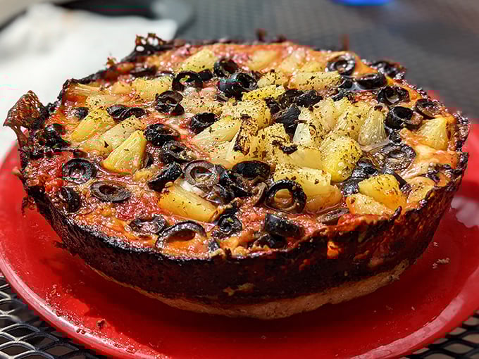 The legendary caramelized crust in all its glory – where cheese meets pan in a beautiful marriage of flavor and texture.