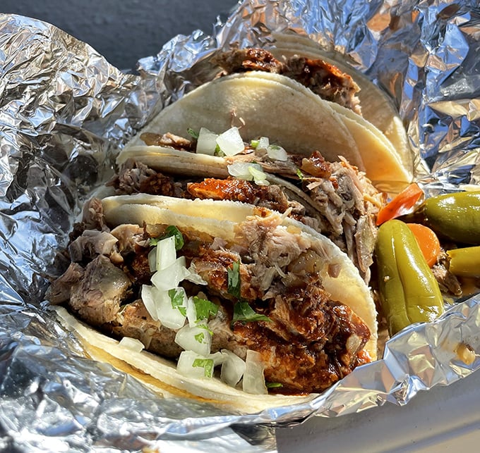 Three tacos, infinite happiness. The simplicity of corn tortillas, perfectly prepared meat, and fresh toppings is culinary poetry in motion.