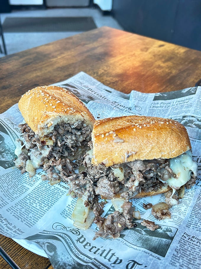 Window seat with a view of Philly and a sandwich that demands both hands? That's not lunch—that's an urban picnic.