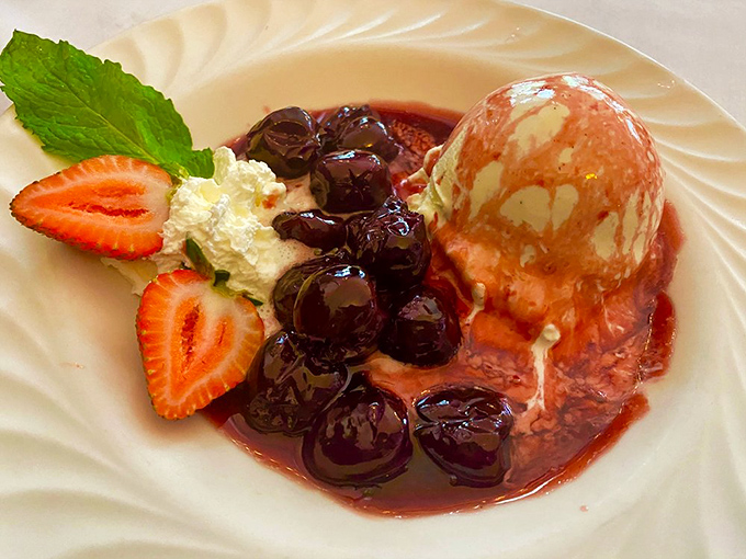 Ice cream and cherries jubilee—where warm meets cold in a dessert that's been making people smile since your grandparents' first date.