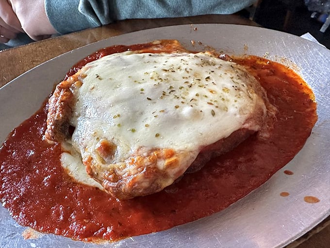 Chicken parmigiana swimming in marinara with melted cheese that stretches to the heavens—this is what comfort food dreams are made of.