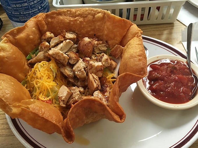 Not just a taco salad—a fortress of flavor. Crispy tortilla shell packed with protein and veggies, proving lunch at a breakfast joint is never an afterthought.