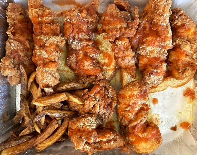 Crispy on the outside, tender within—these chicken strips with fries aren't just a meal, they're comfort in edible form.
