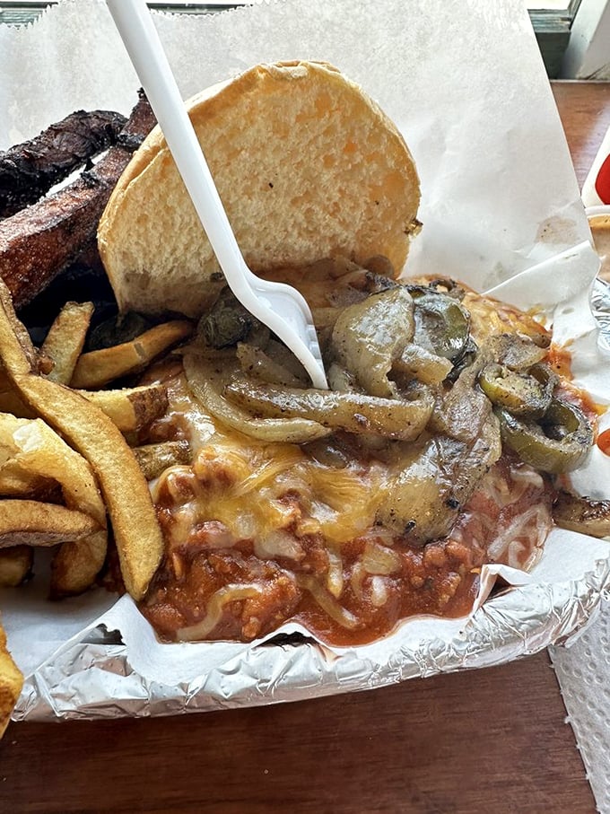 When chili meets burger, beautiful things happen. This messy masterpiece demands both napkins and your complete, undivided attention.
