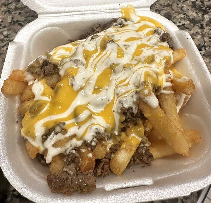 These loaded fries are what would happen if a baked potato and French fries had a beautiful baby, then covered it in cheese, meat, and pure joy.