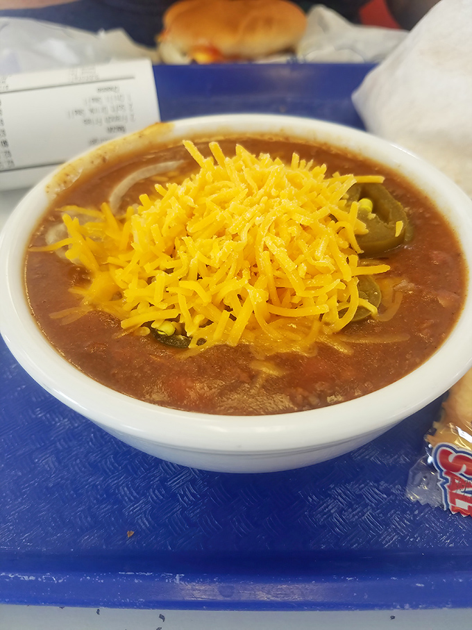 Wilson's famous chili, topped with a mountain of shredded cheddar. This isn't some bean-heavy concoction – it's meat-forward, Ohio-style comfort that inspires fierce loyalty.