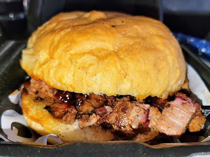 This isn't just a sandwich—it's a monument to meat, a shrine to smoke, a bun-held miracle that makes other lunches look like punishment.