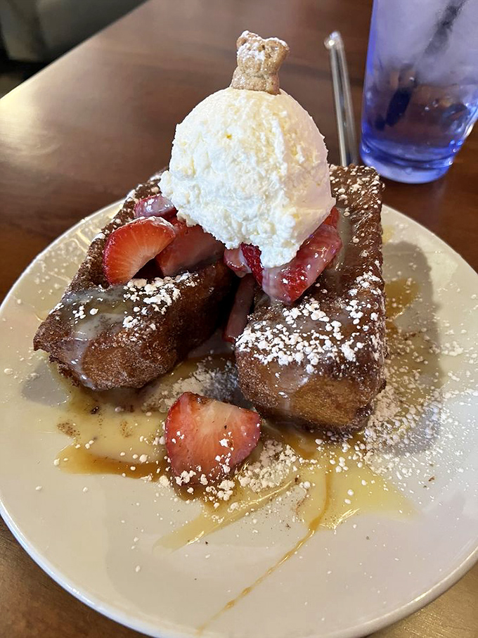 Churro French toast that makes you question why regular French toast even exists. That scoop of ice cream isn't asking permission—it knows it belongs there.