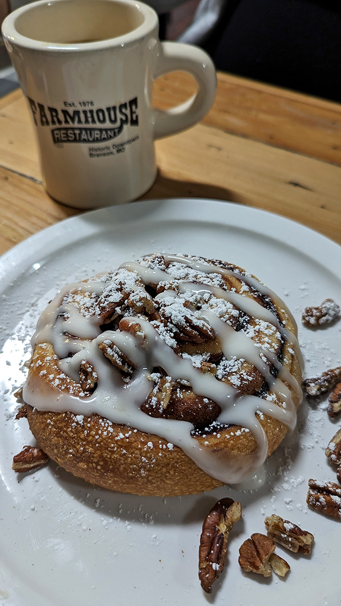 Not just any cinnamon roll—this is the "I'll-do-an-extra-mile-on-the-treadmill-tomorrow" kind, topped with pecans and sweet glaze.