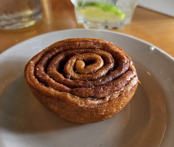 The humble cinnamon roll, transformed into an art form. Spiral-shaped evidence that sometimes the simplest pleasures deliver the most satisfaction.