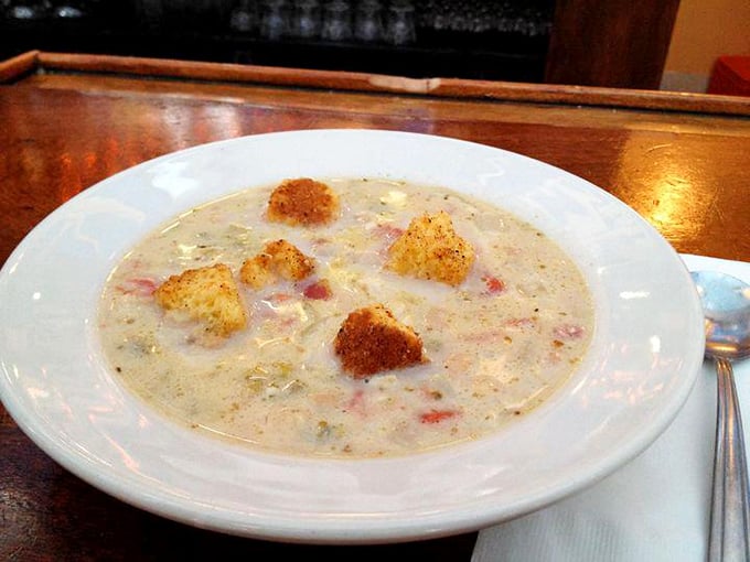 A bowl of chowder so creamy and rich it deserves its own zip code. The steam rising like morning fog on a New England harbor.