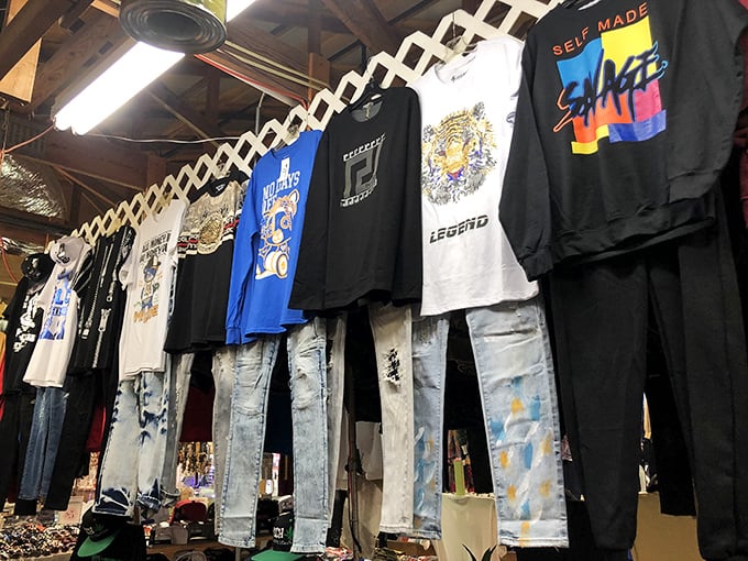 The denim and graphic tee collection—where fashion statements hang in suspended animation, waiting for the right person to give them voice again.