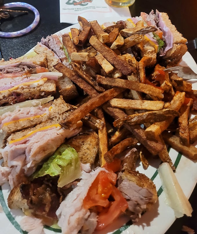The club sandwich—architecture you can eat. Layers of deli goodness flanked by perfectly toasted bread, with fries so golden they deserve their own trophy case.