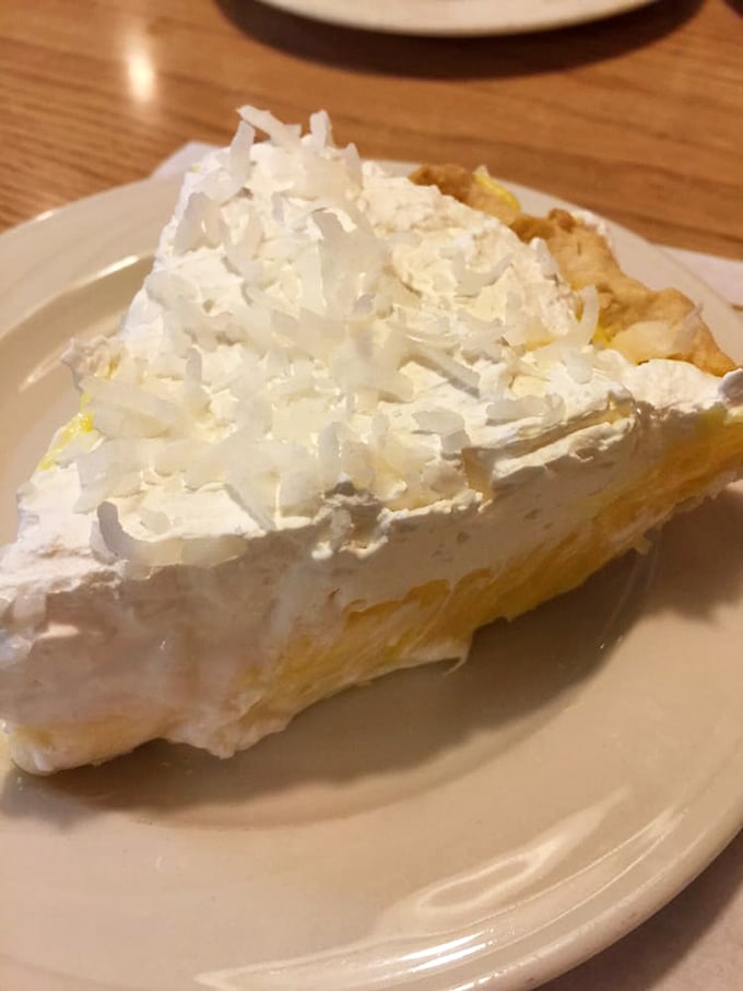 This coconut cream pie doesn't just have height – it has presence. The meringue stands tall like a delicious, fluffy cloud atop paradise.