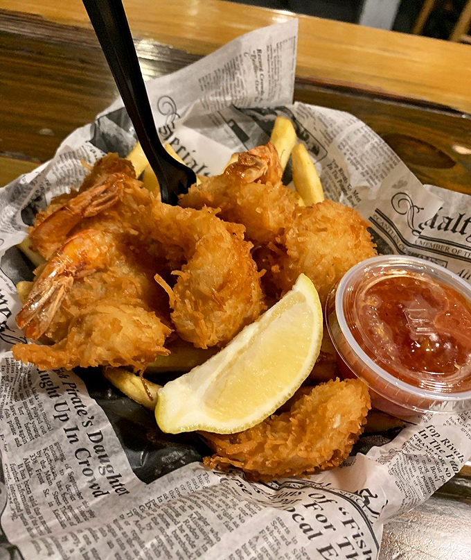 These golden-battered shrimp look like they're wearing tiny tuxedos to the most delicious formal event in town.