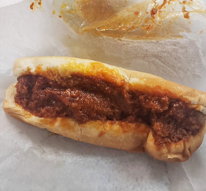 The classic coney dog – where spiced meat sauce meets soft bun in a relationship so perfect it should have its own reality show.