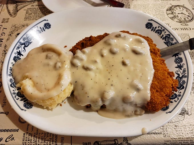 Country fried steak smothered in mushroom gravy that should come with a warning: "May induce immediate food coma and nostalgic sighs of contentment."