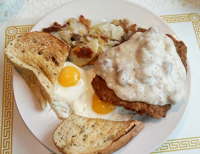 Country-fried steak smothered in gravy that could make a vegetarian question their life choices, served with toast that's actually toasted properly.