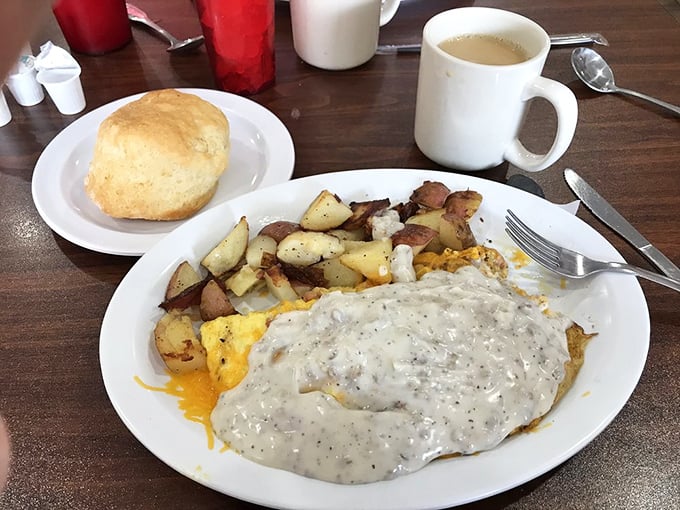 This isn't just breakfast—it's an event. When your plate arrives with a fluffy biscuit sidekick, you know you're in good hands.