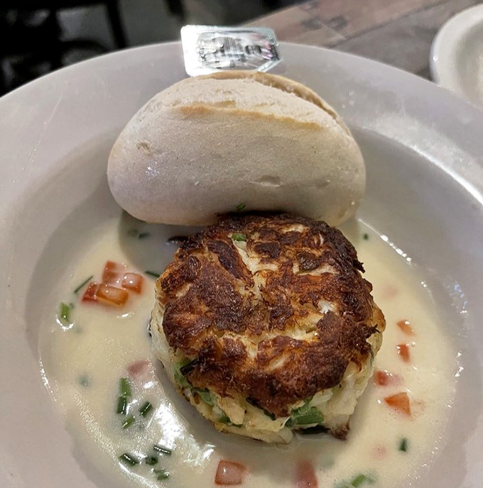 This crab cake isn't playing games—all jumbo lump crab with minimal filler, served with a sauce that deserves its own fan club.