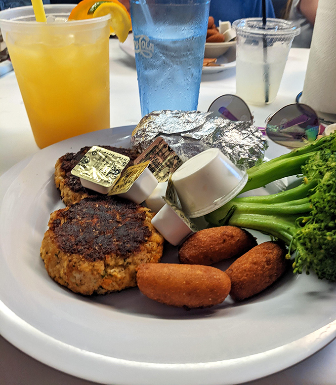 Crab cakes and hushpuppies – the dynamic duo of Chesapeake cuisine. Notice how the crab cake is mostly crab, not cake – as nature intended.