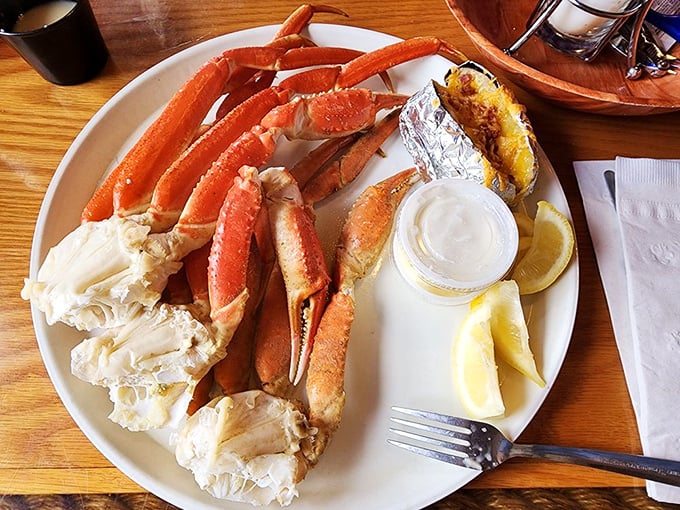 Snow crab legs arranged like nature's perfect eating puzzle—where the solution is always buttery, sweet satisfaction.