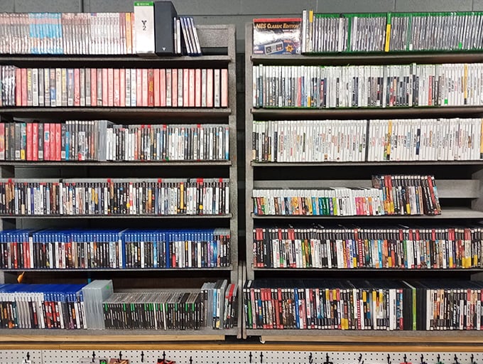 The DVD wall – a physical Netflix from the era when "streaming" just meant what happened when you left the garden hose running.