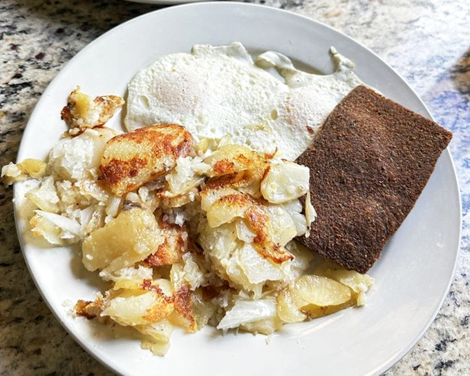 Biscuits smothered in gravy—the breakfast dish that hugs you from the inside. Comfort food doesn't get more comforting than this.