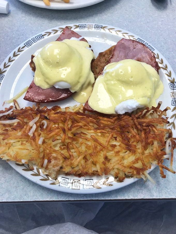 Eggs Benedict that makes you understand why people wait in line on Sunday mornings—hollandaise sauce cascading like a yellow waterfall of happiness.