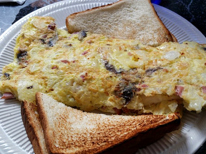 The Farmer's Dutch Fry Omelet: where breakfast meets comfort food in a beautiful, cheese-covered Pennsylvania love story.