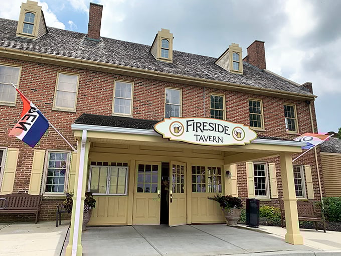 The Fireside Tavern stands proud in its colonial brick splendor—a place where you half-expect to see Benjamin Franklin nursing an ale in the corner booth.
