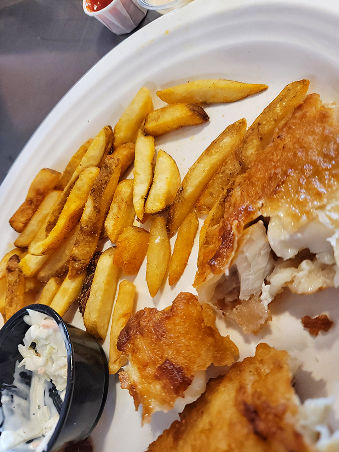 Fish and chips that achieve the golden ratio of crispy exterior to flaky interior. That side of coleslaw isn't just a garnish—it's a palate refresher.