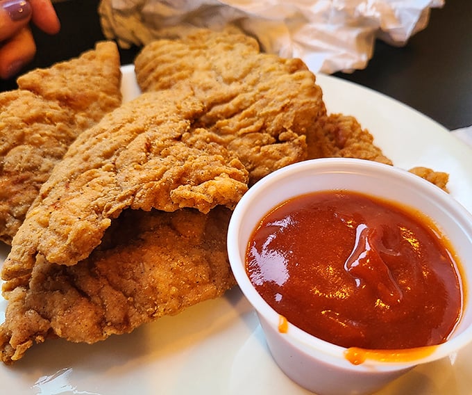 This isn't just fried fish—it's a crispy-coated love letter to Lake Erie, served with a side of tangy sauce that cuts through the richness perfectly.